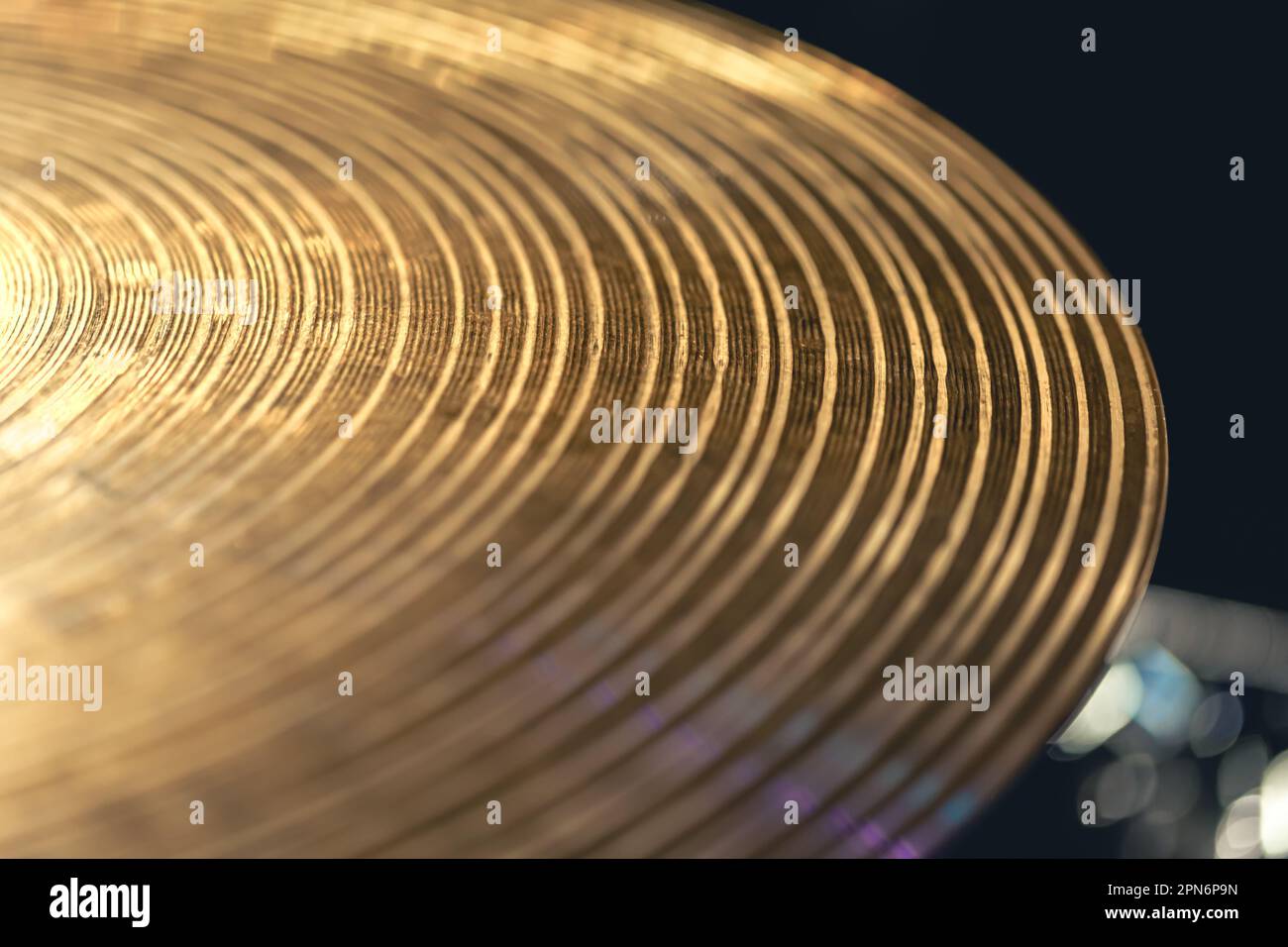 Drum cymbal close-up on a dark background Stock Photo - Alamy