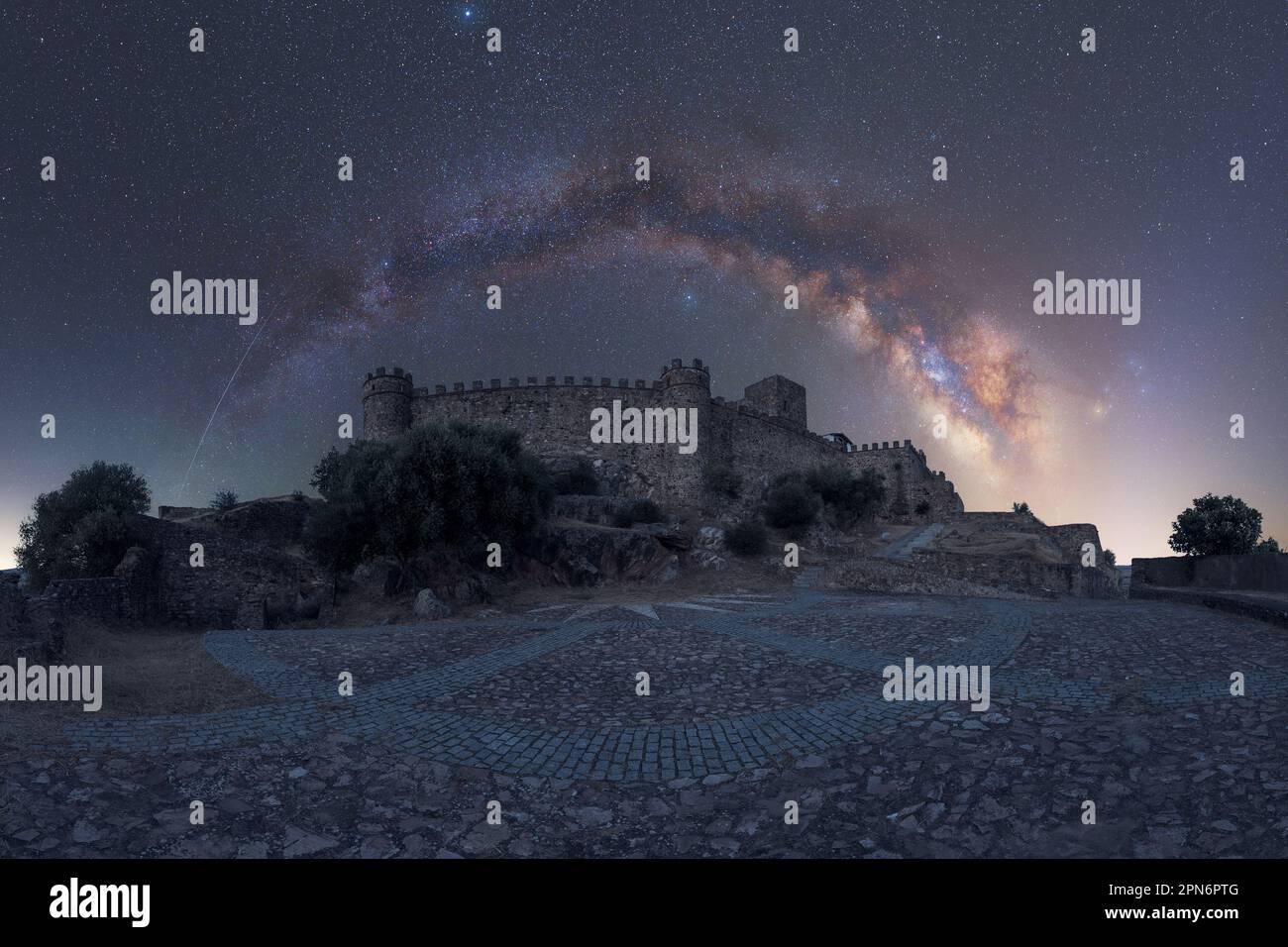 Milky way and meteor in the castle Stock Photo - Alamy