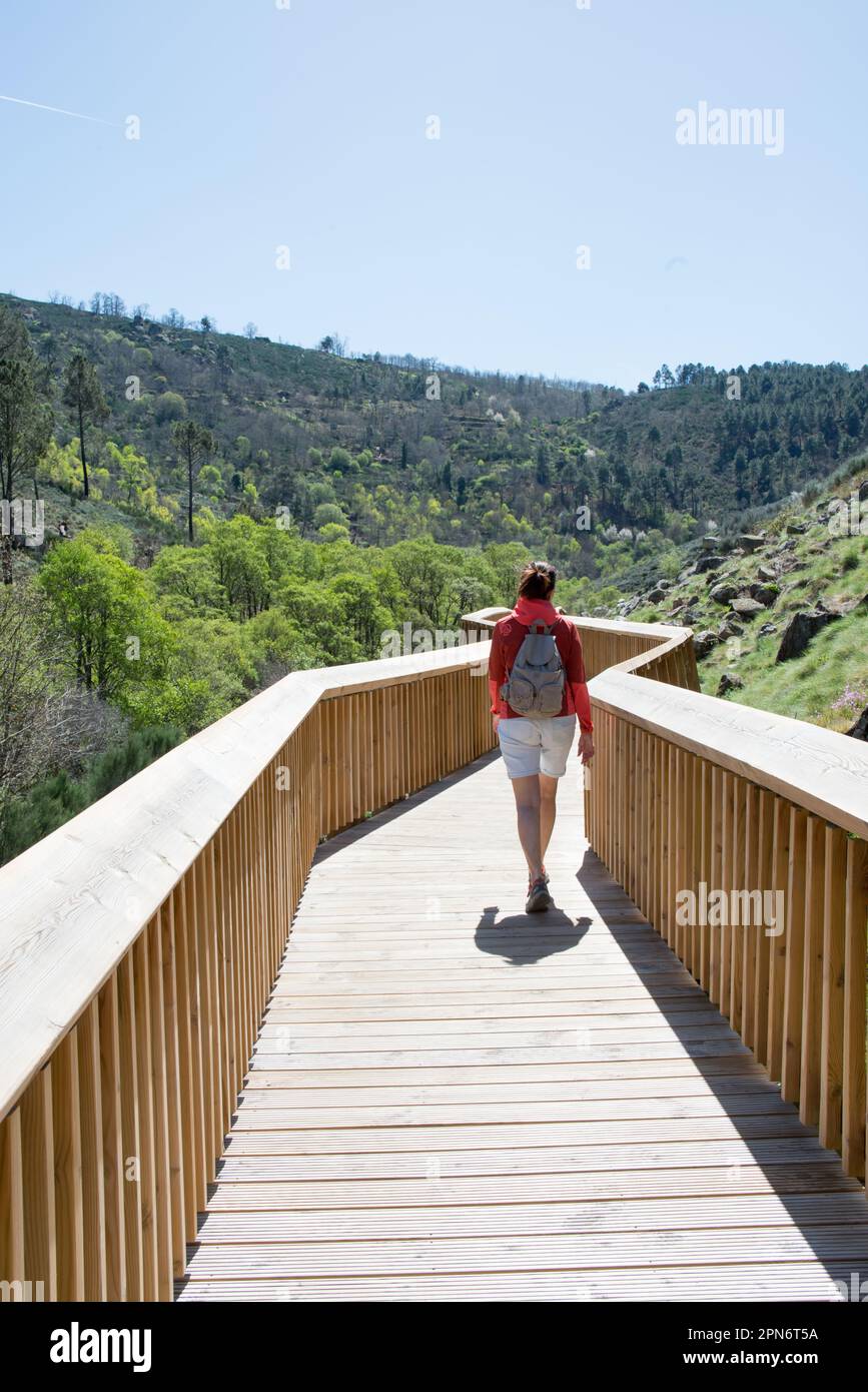 Atletic woman seen from her back at Mondego walkways, Portugal Stock ...