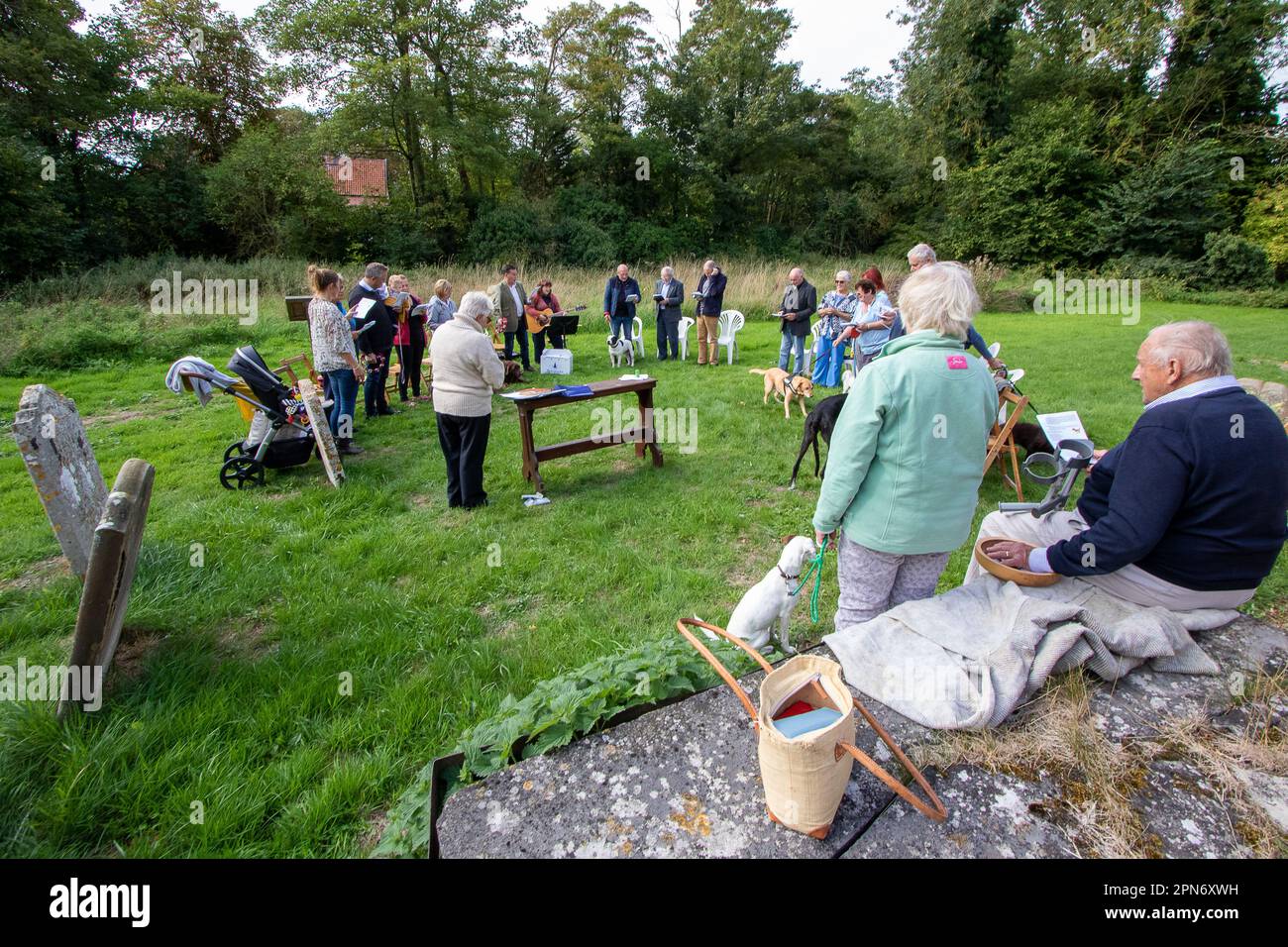 People with their animals gathered in the churchyard of St Lawrence's ...