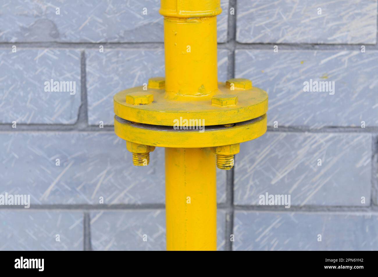 Pipe and yellow valve Stock Photo - Alamy