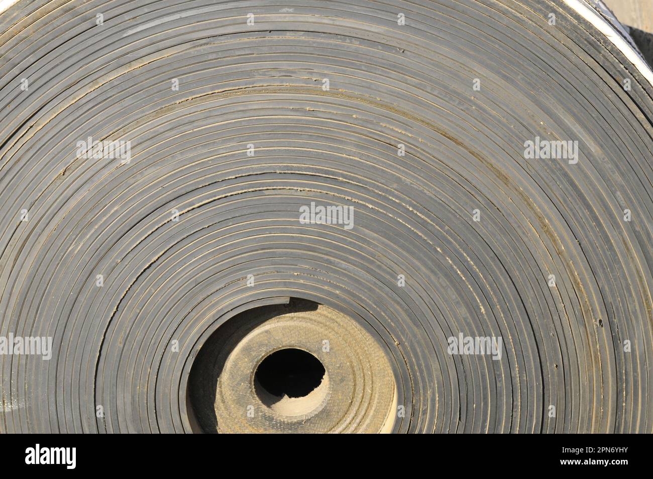 Take line black insulating rubber roller Stock Photo - Alamy
