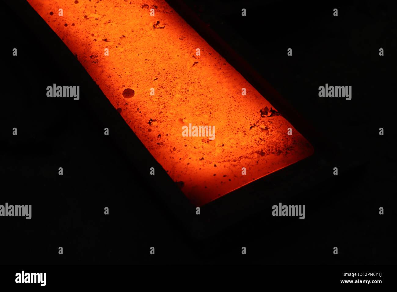 Melting metal pouring yellow sparks hi-res stock photography and images ...