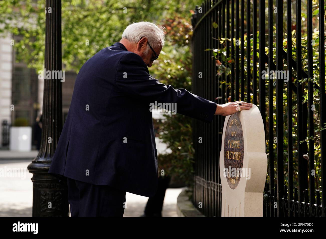 Former Metropolitan Police officer John Murray lays a wreath at a ...