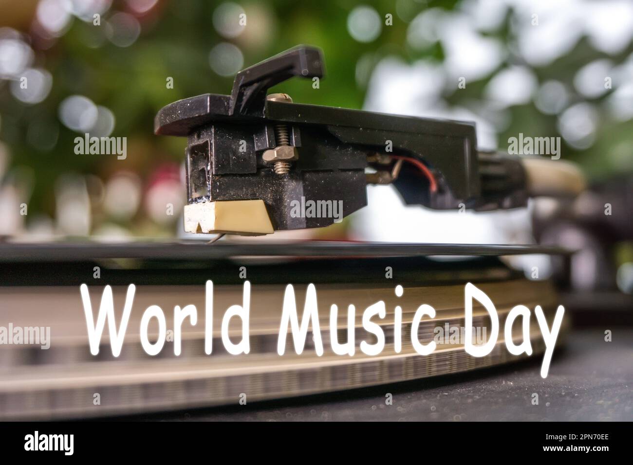 World Music Day, record player plays a track from black vinyl. spinning ...