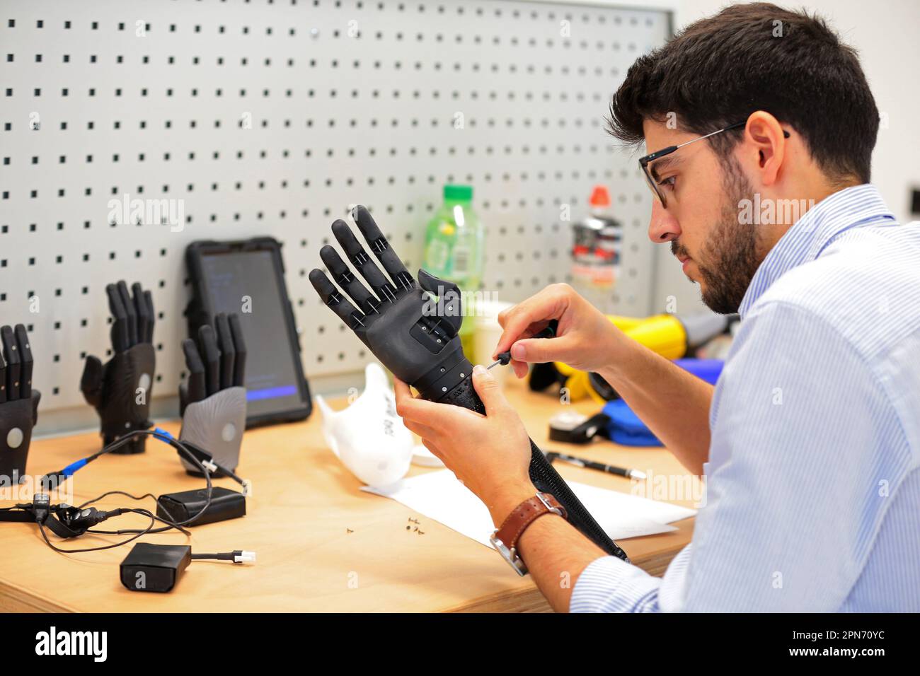 LVIV, UKRAINE - APRIL 14, 2023 - A doctor holds a prosthetic arm during ...