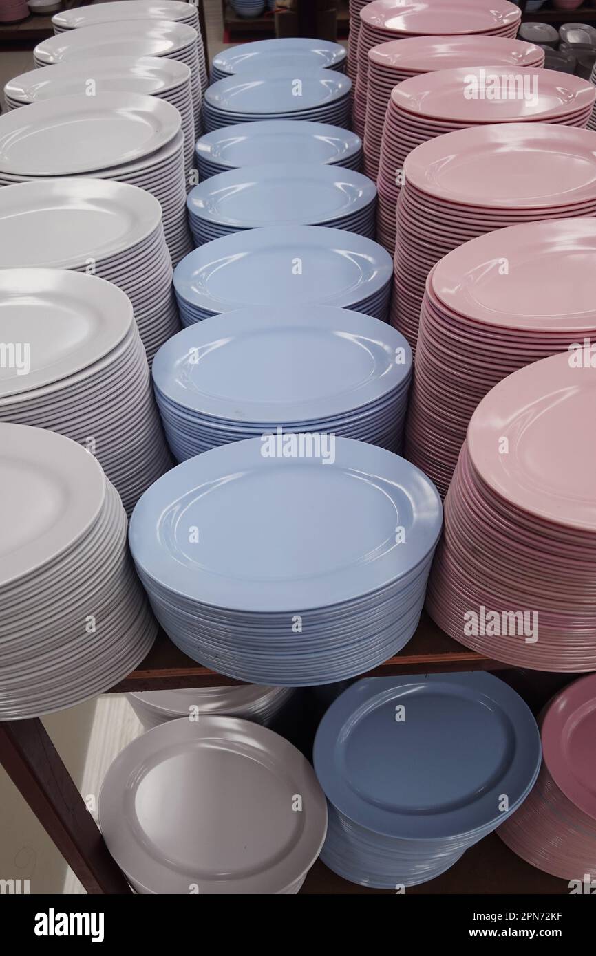 Stacks of plates in a shop Stock Photo - Alamy
