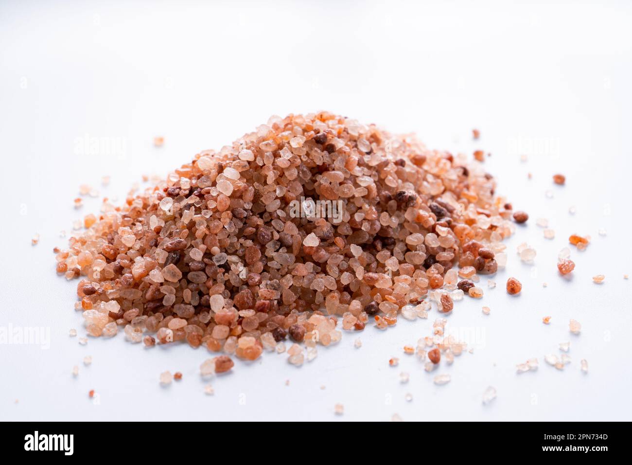 Himalayan pink salt is herb seasoning isolated on white background with ...