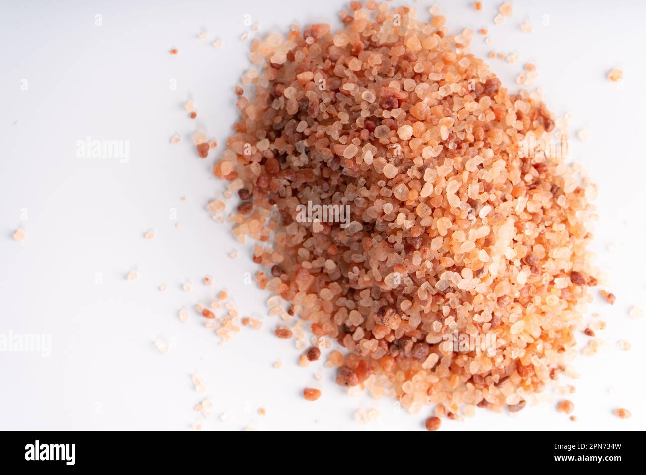 Himalayan pink salt is herb seasoning isolated on white background with ...