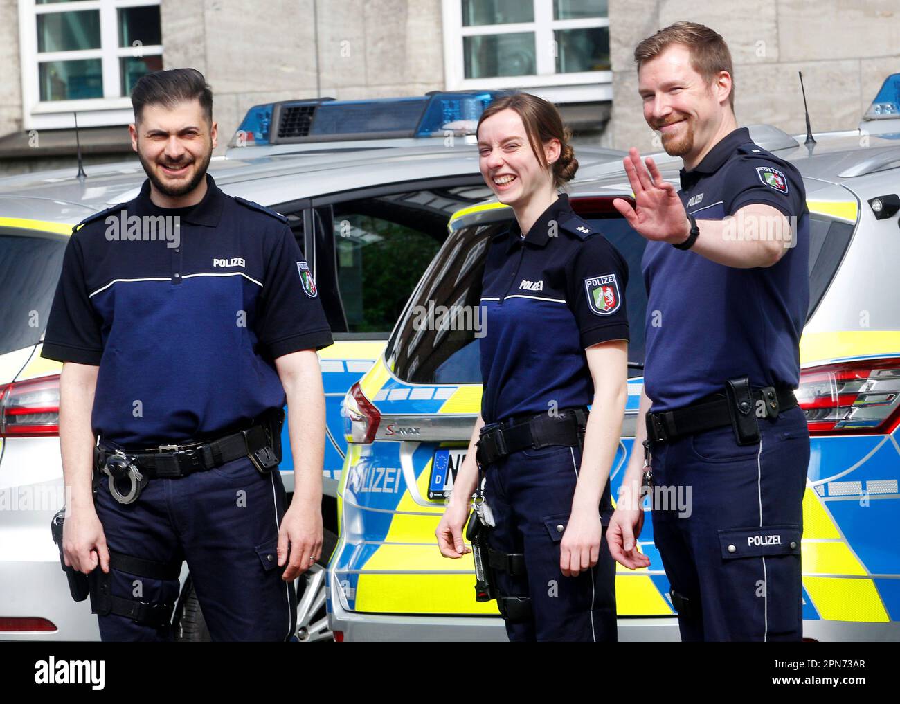 Bochum, Germany. 17th Apr, 2023. A policewoman and two of her ...