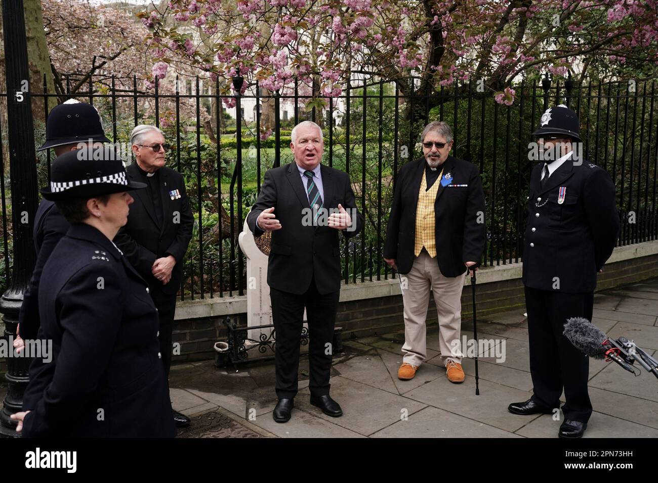Mike Penning MP address the crowd before he lays a wreath at a memorial ...