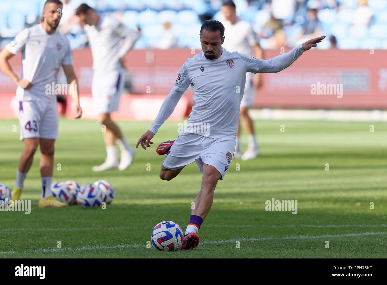 Sydney, Australia. 16th Apr, 2023. Ryan Williams of Perth Glory warms ...
