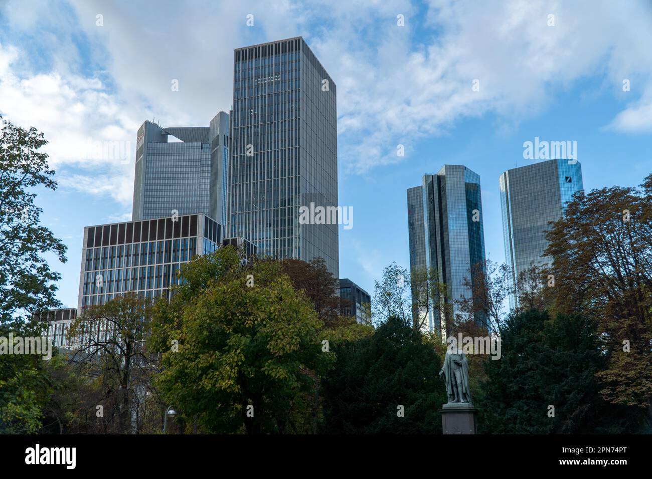 Old monuments and buildings with tall skyscrapers in the background ...