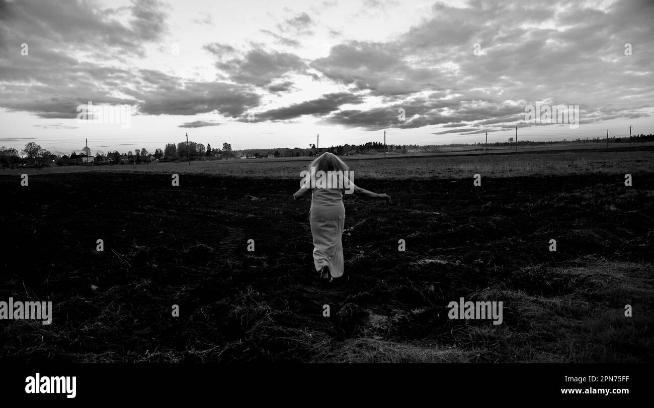 Running woman Black and White Stock Photos & Images - Alamy