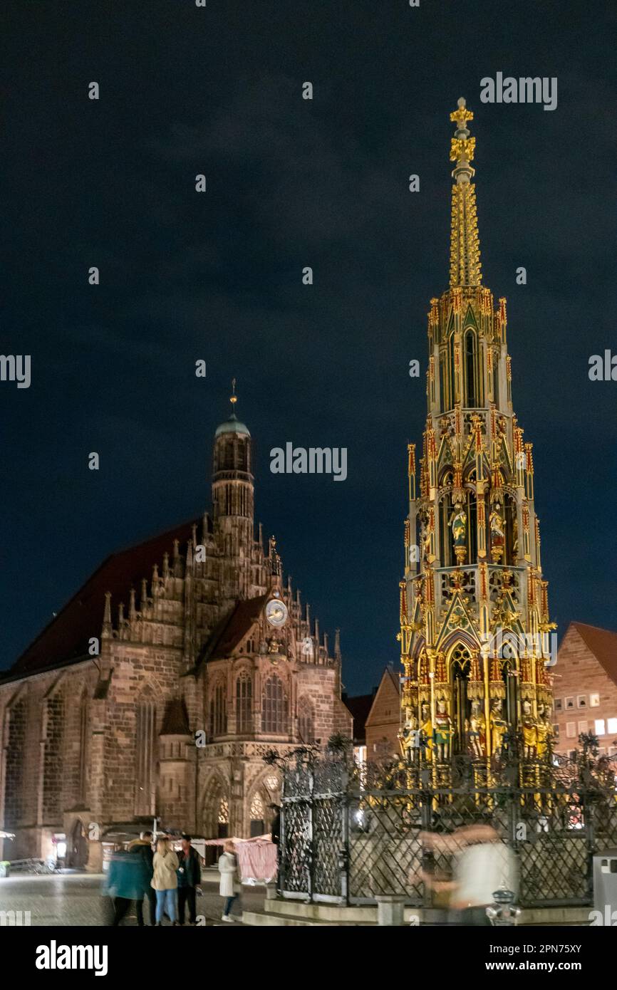 NUREMBERG, GERMANY – NOVEMBER 21, 2022: The beautiful Schoner Brunnen ...