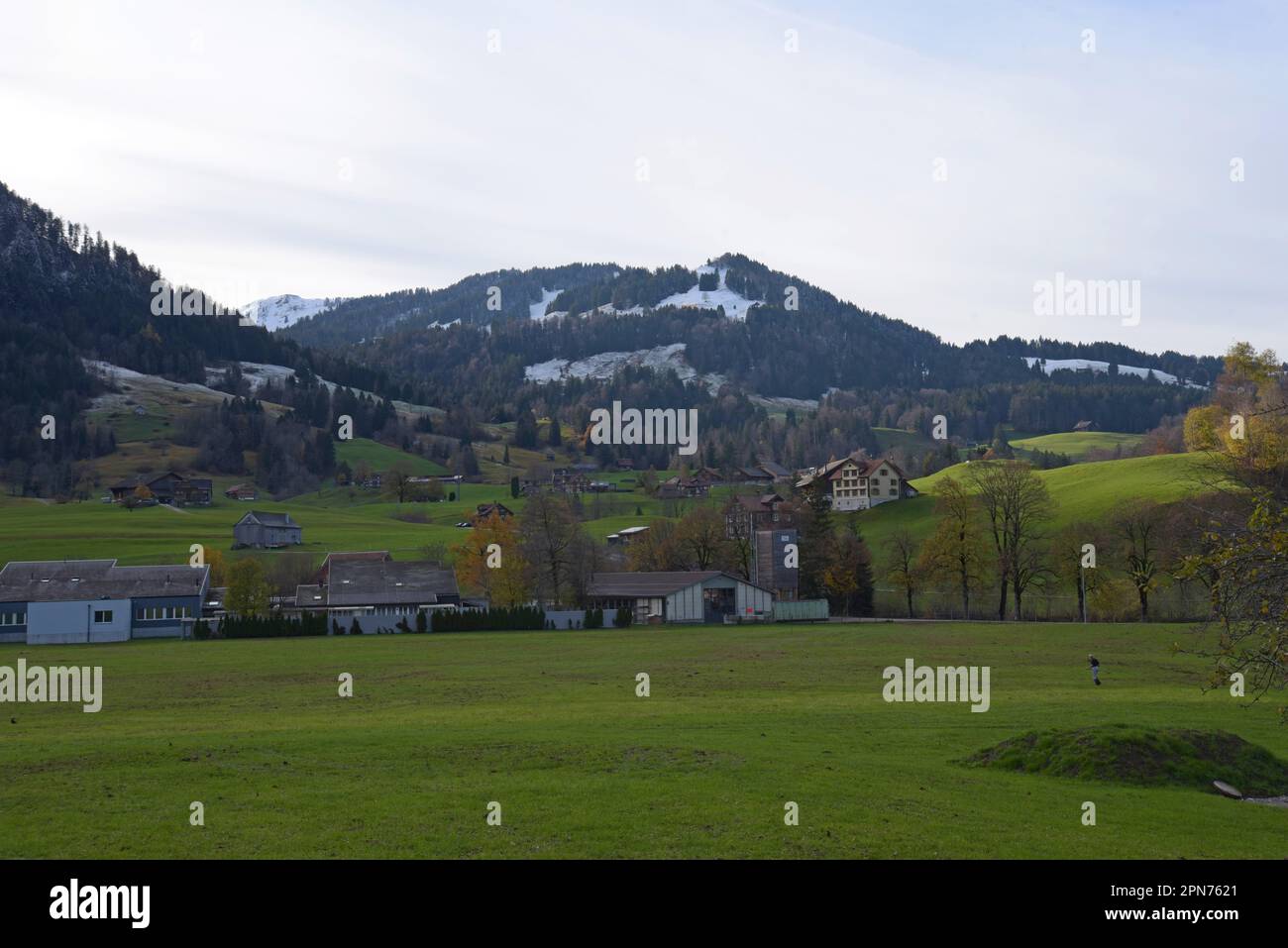 A view of Krummenau village and snow on the mountains in the St Gallen ...