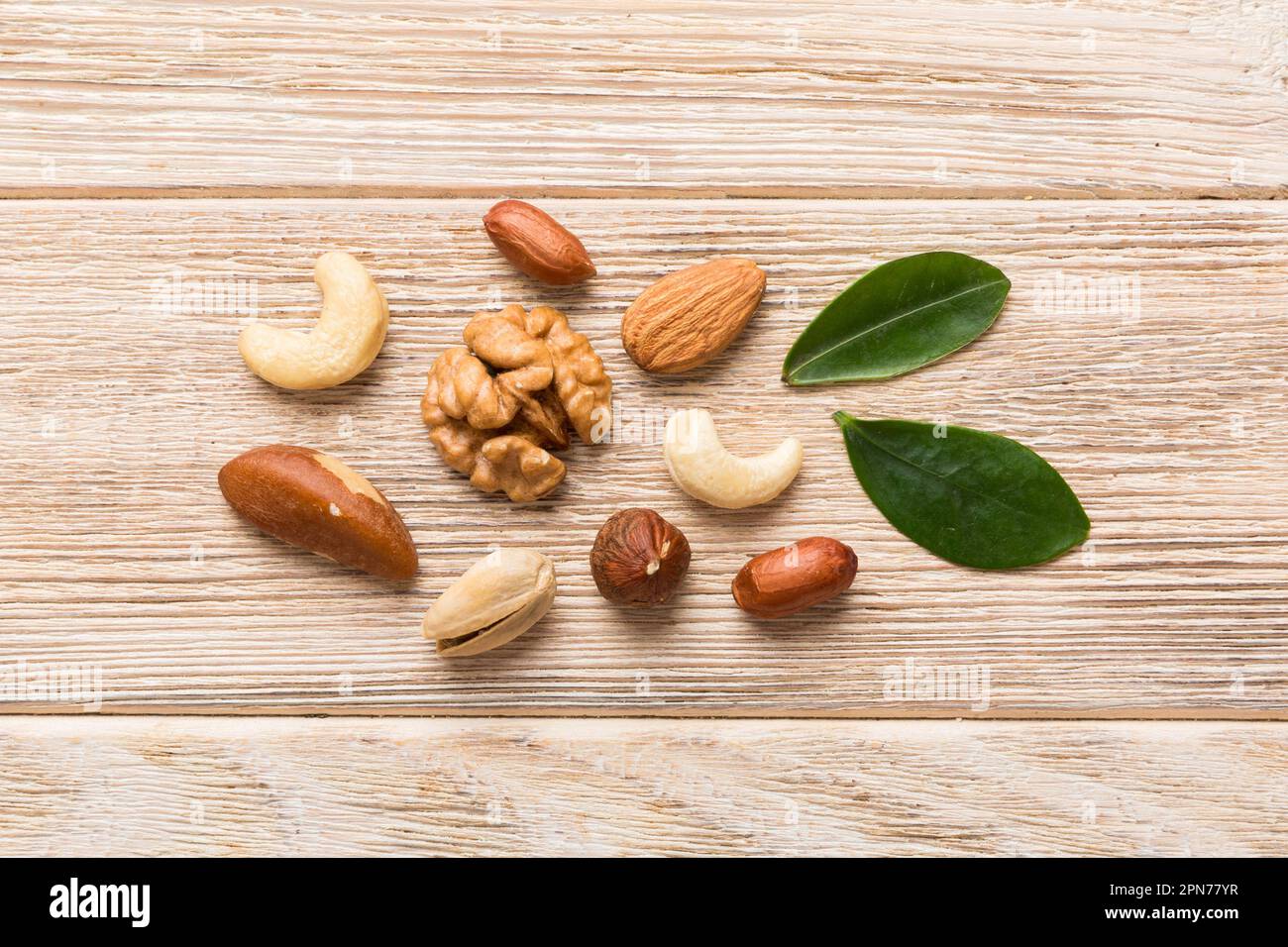 Composition of nuts , flat lay - mix hazelnuts, cashews, almonds on ...