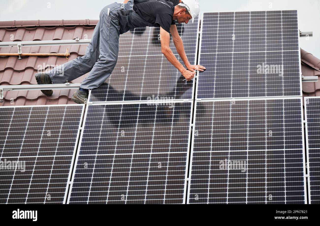 Worker tightening solar panel hi-res stock photography and images - Alamy