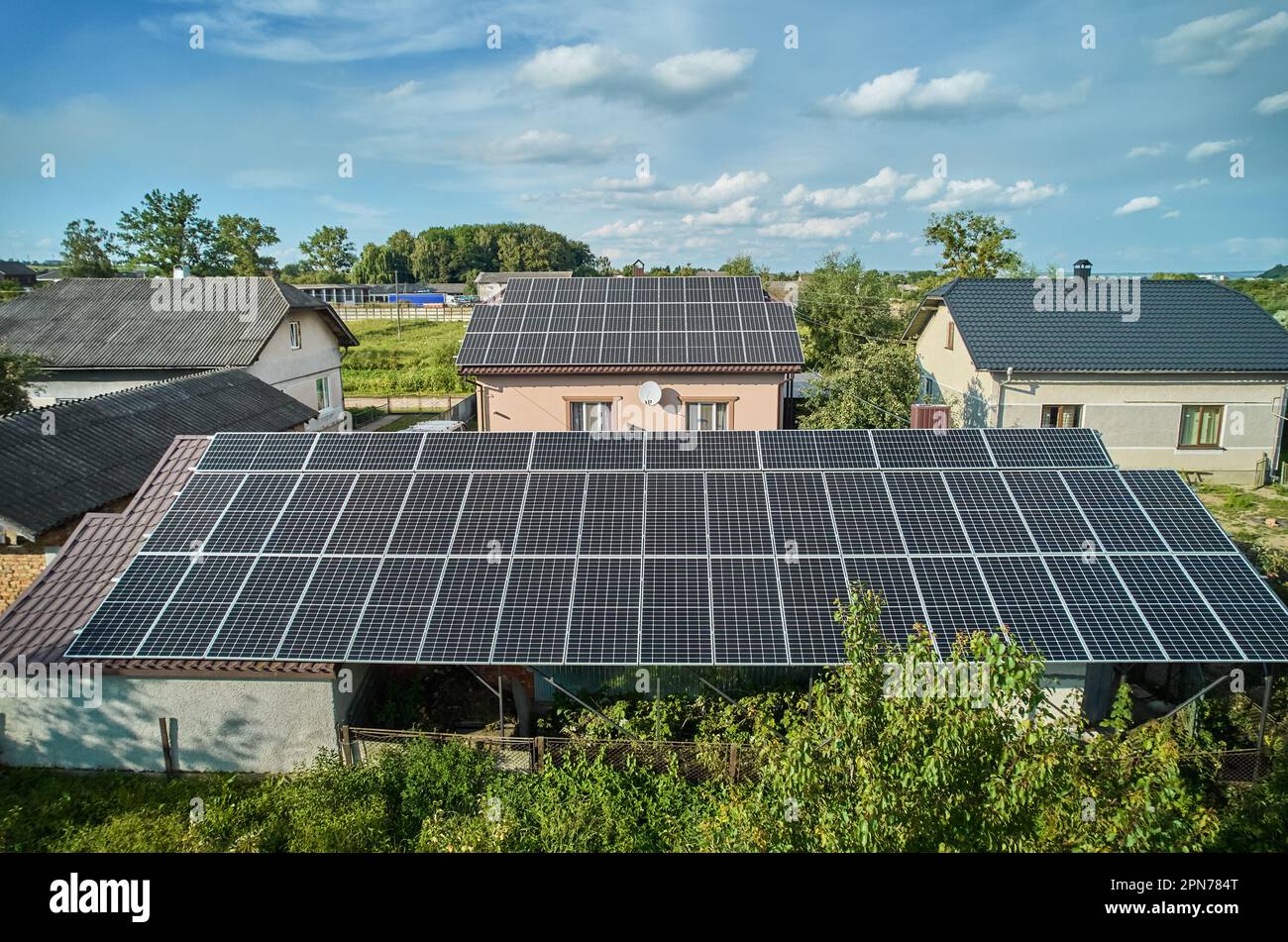Aerial top view of new modern house cottage with solar photovoltaic ...