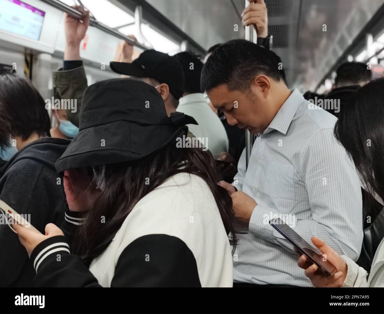 BEIJING, CHINA - APRIL 17, 2023 - Passengers wearing masks and not ...
