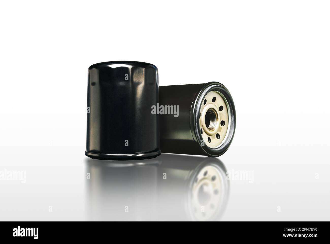 Motor oil filter isolated on white background with reflection included ...