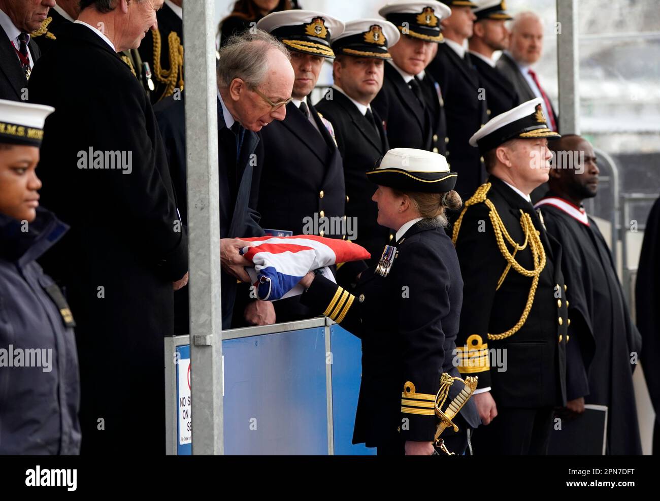 Commanding officer Commander Claire Thompson (right) hands over the ...