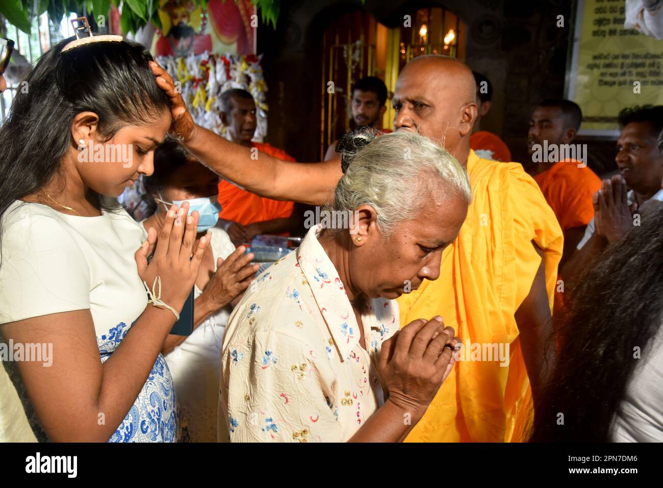 Kotte Rajamahavihara temple chief incumbent anoints the Devotees at the ...