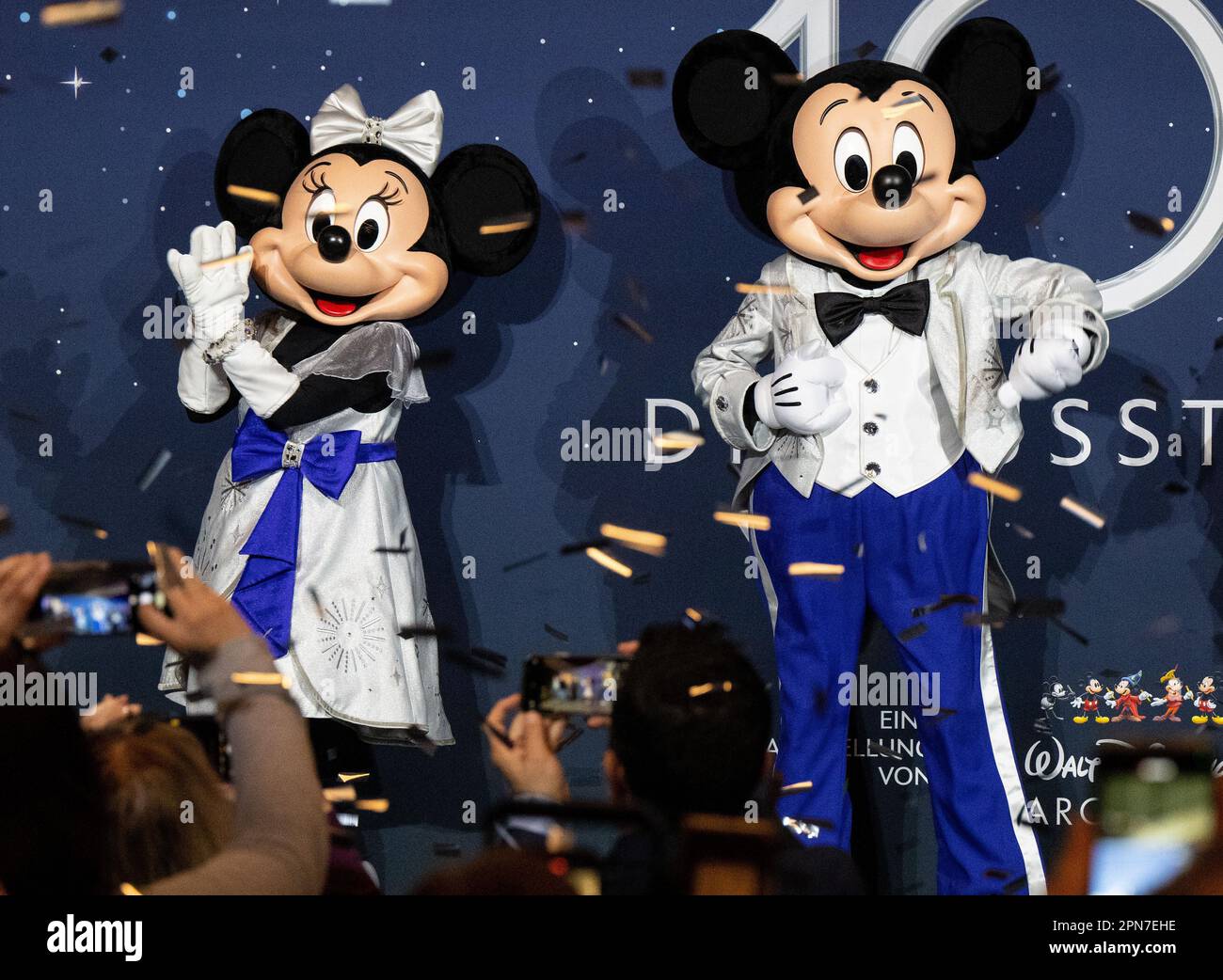 Munich, Germany. 17th Apr, 2023. Mickey and Minnie Mouse take part in a ...