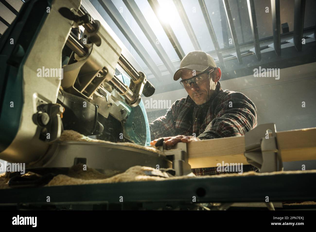 Professional Woodworker Operating a Table Saw in His Workshop ...