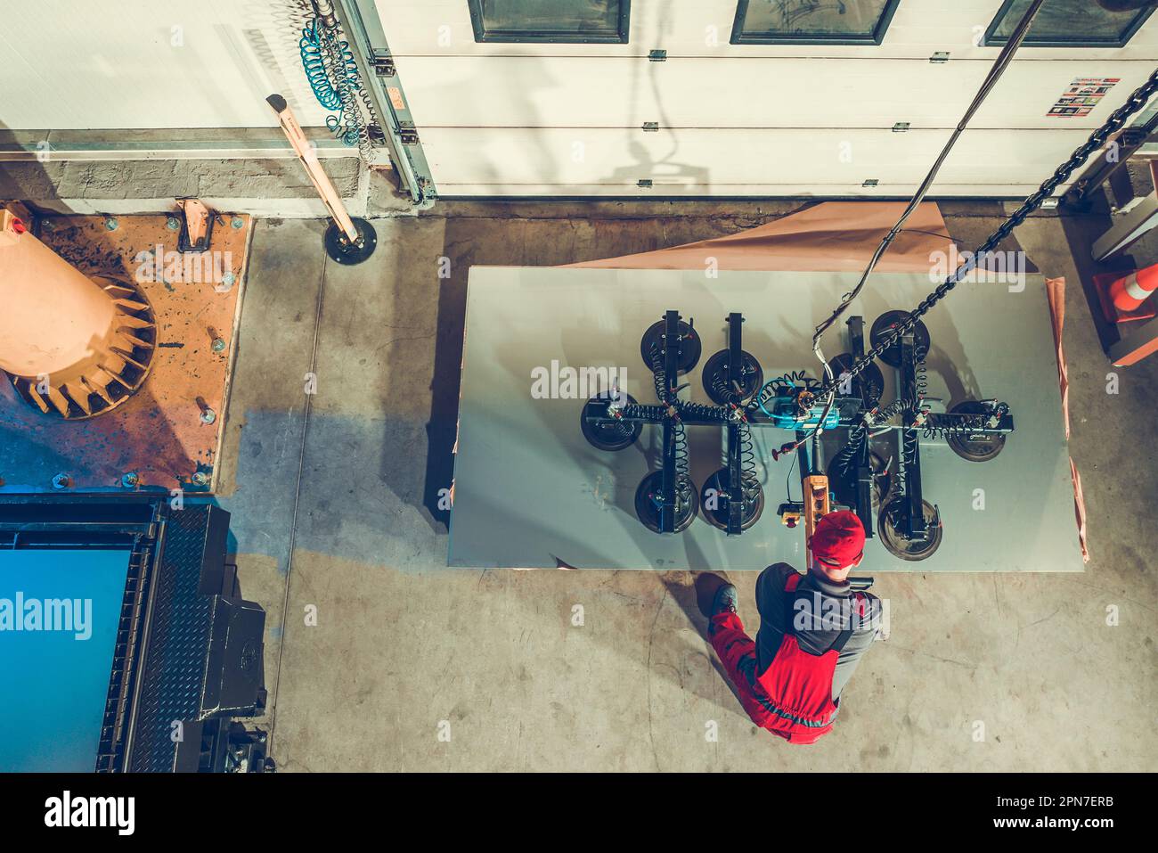 Top View of Commercial Suction Lift Equipment Being Operated by ...
