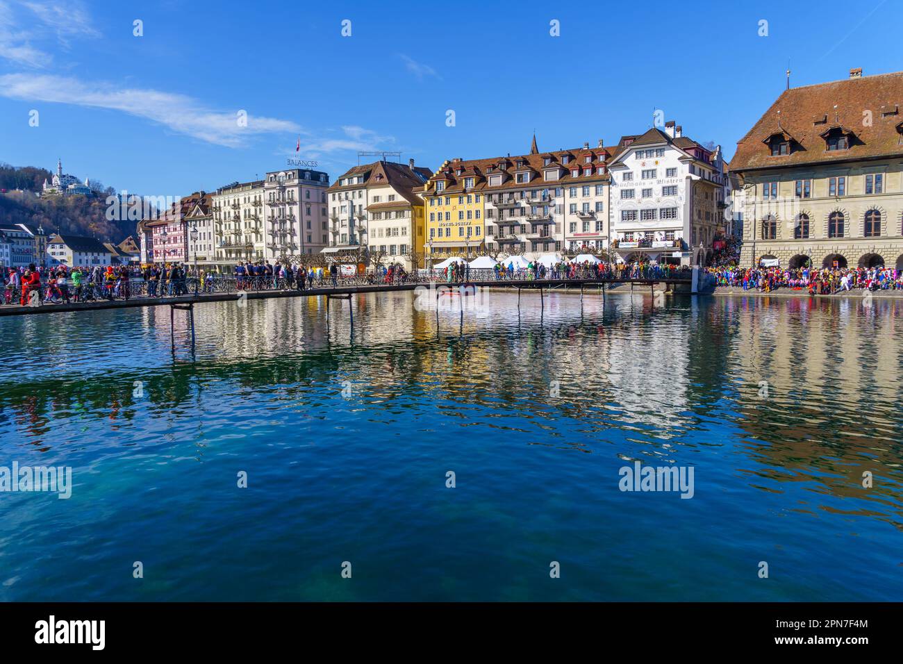 Lucerne, Switzerland - February 20, 2023: Scene of streets crowded with ...