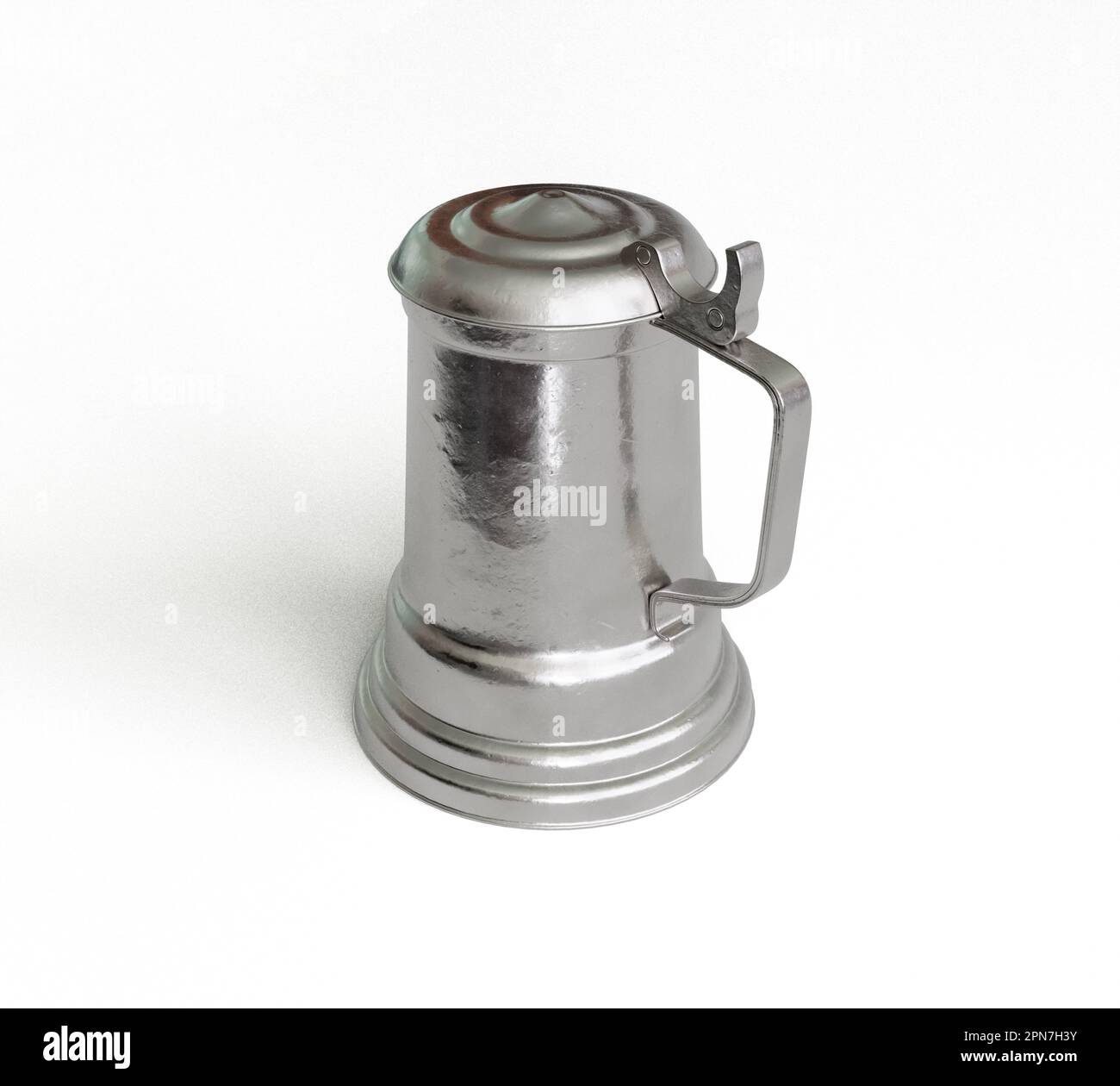 A vintage silver drinking tankard with a lid on an isolated white ...