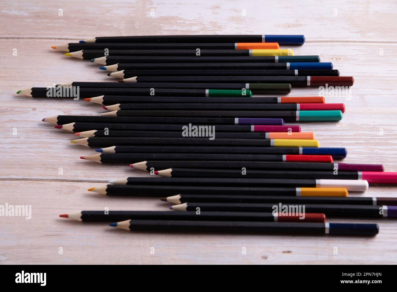 photo a lot of colored pencils lying in a row Stock Photo - Alamy