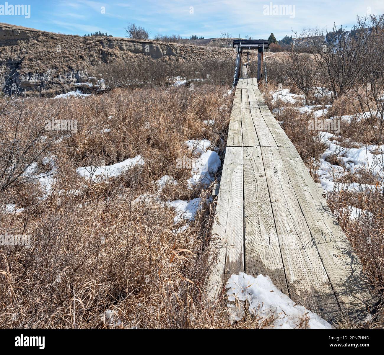 Pedestrian bridge over the Rosebud River at the ghost town of Beynon in ...