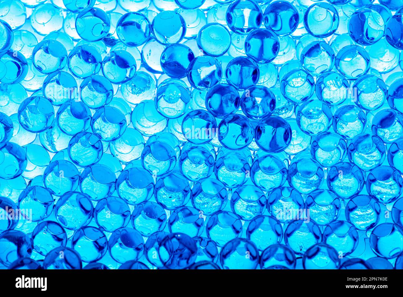 a heap of transparent shiny blue pearls Stock Photo - Alamy