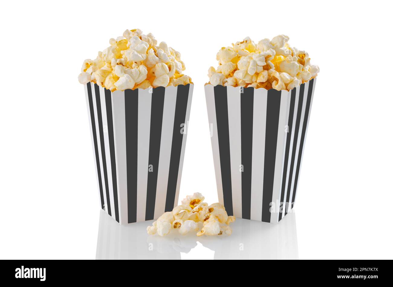 Two black white striped carton buckets with tasty cheese popcorn ...