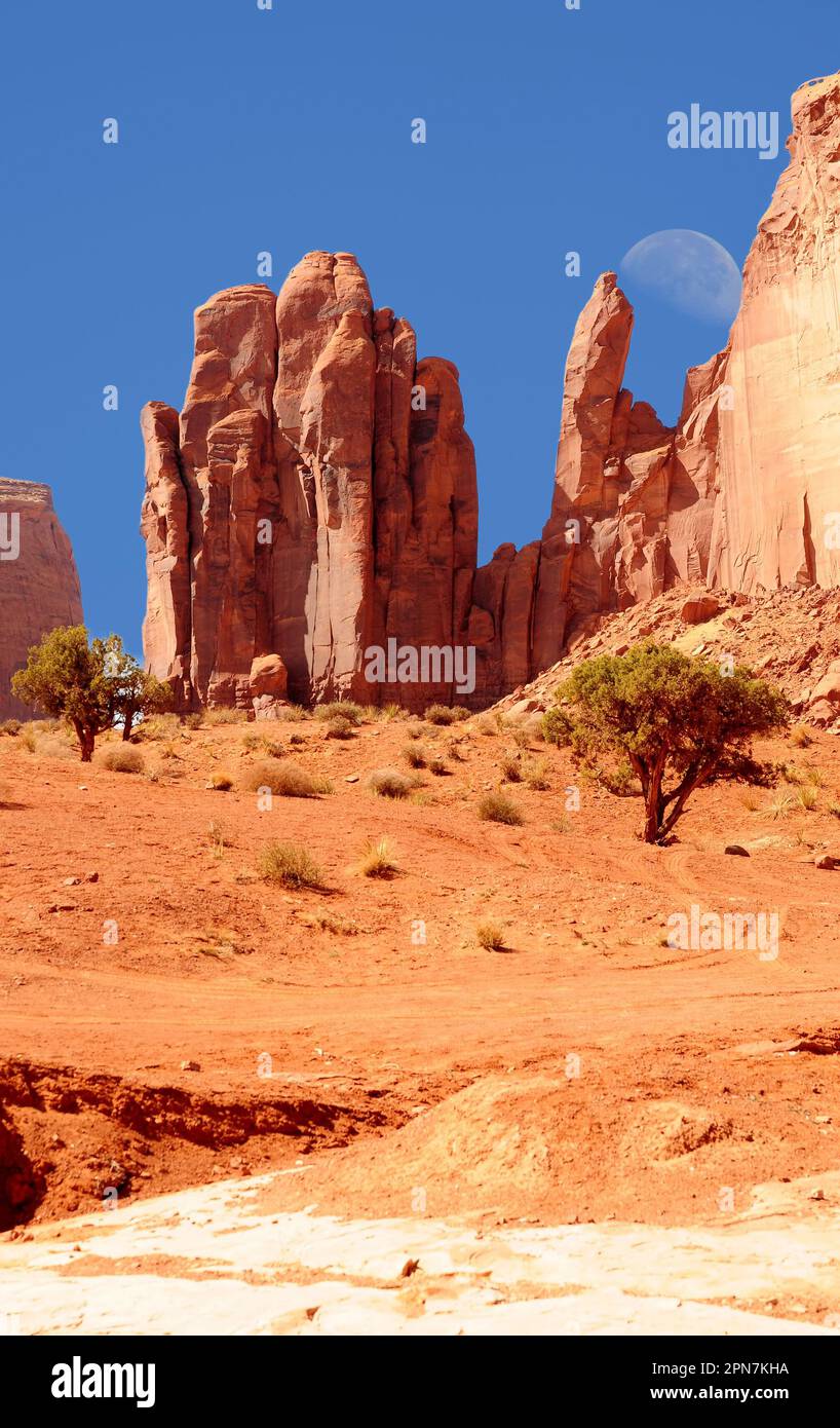 Large half moon over Monument Valley Arizona Stock Photo - Alamy