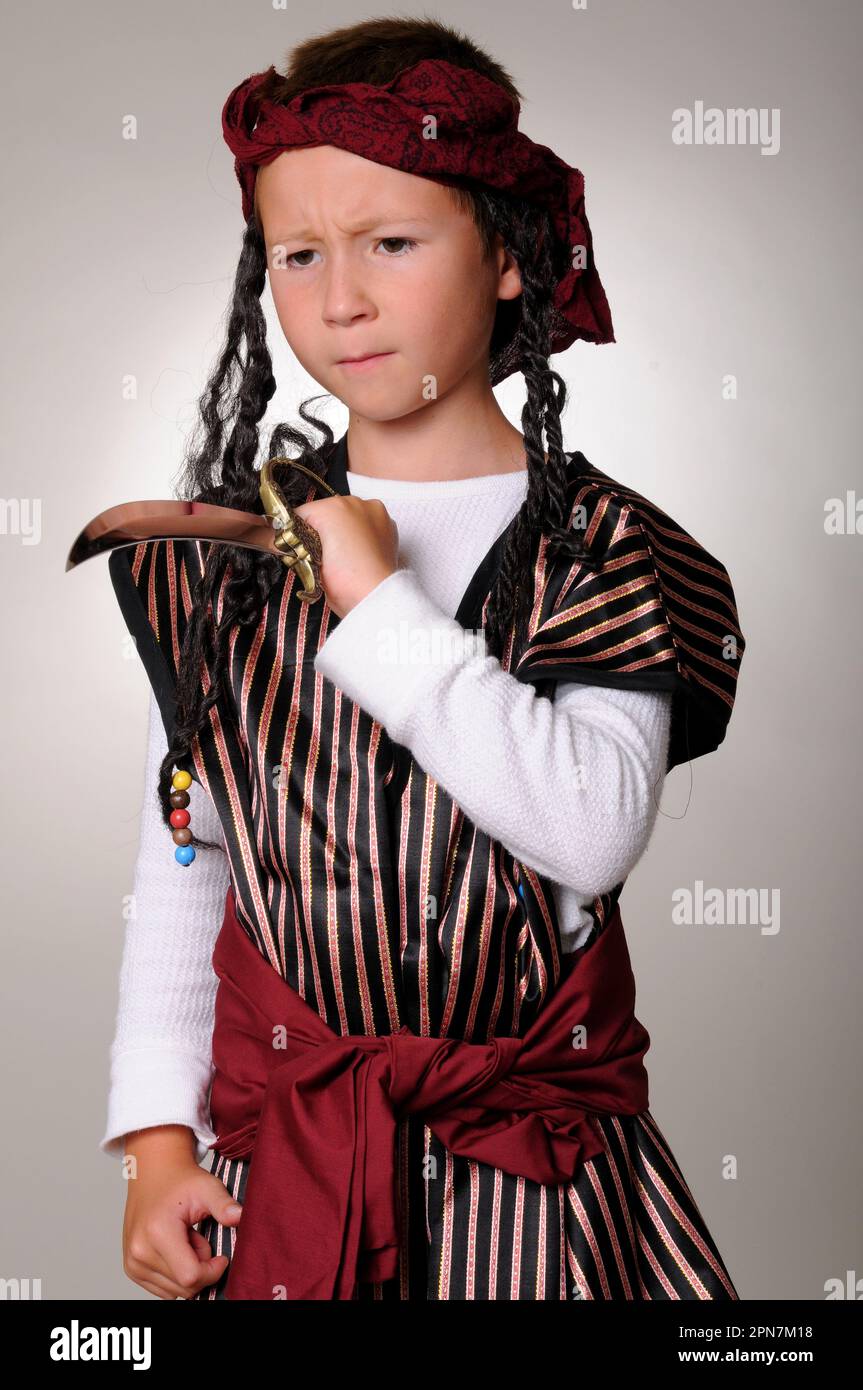 Boy Pirate isolated on gray with a cutlass Stock Photo - Alamy