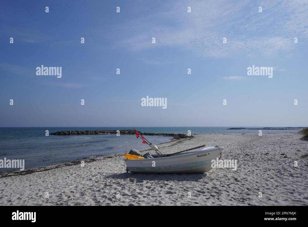 17 April 2023, Schleswig-Holstein, Schönberger Strand: A fishing boat ...