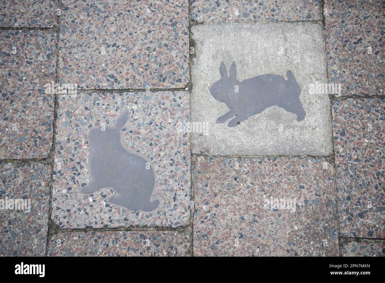 Berlin, Germany. 17th Apr, 2023. Two brass rabbits are placed on ...