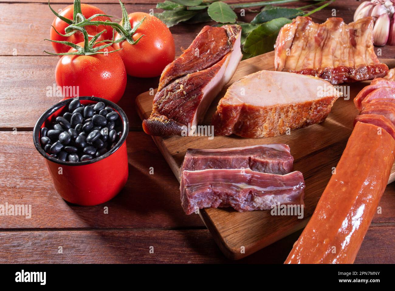 ingredients for brazilian traditional food feijoada Stock Photo - Alamy