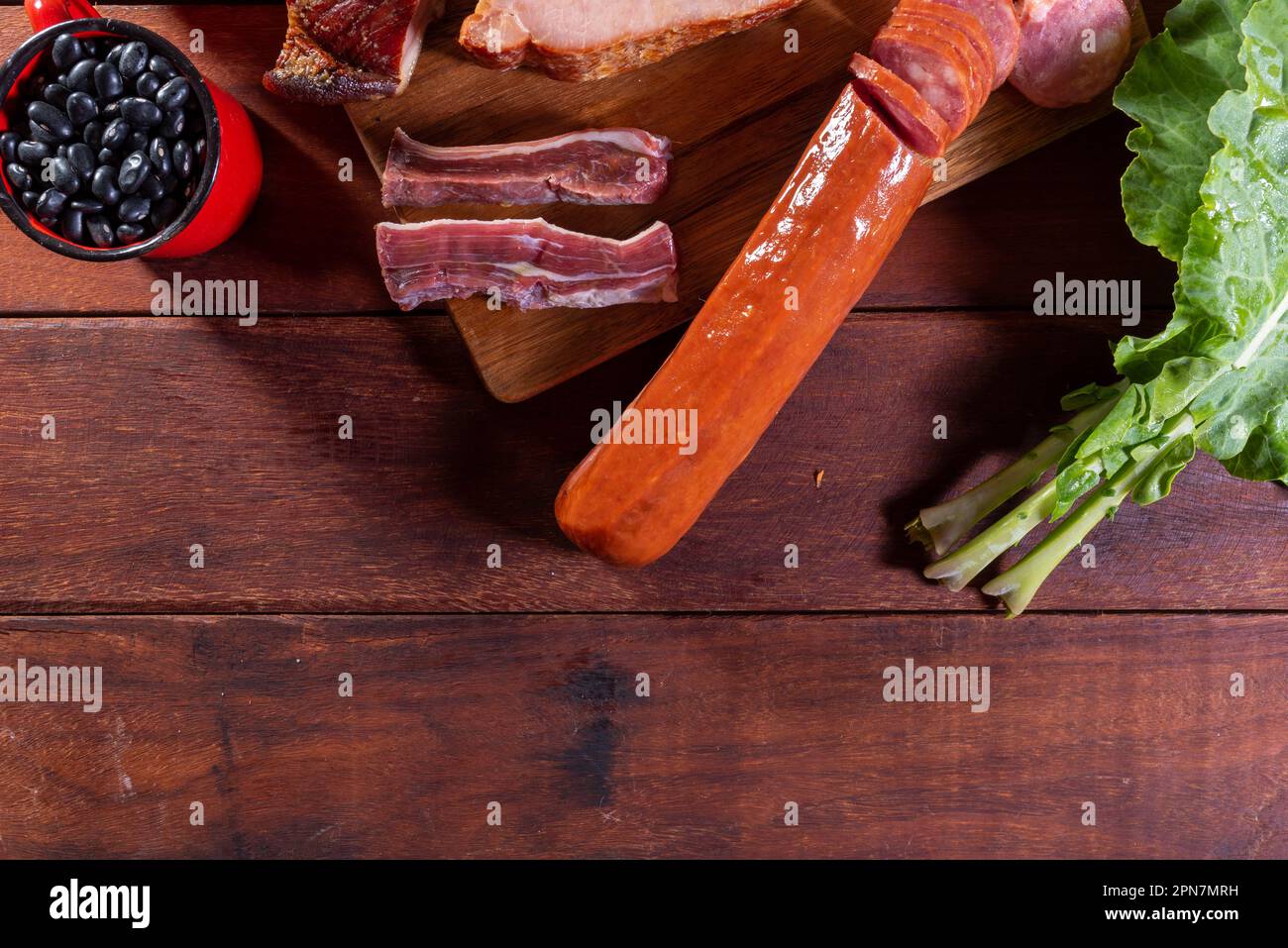 ingredients for brazilian traditional food feijoada Stock Photo - Alamy