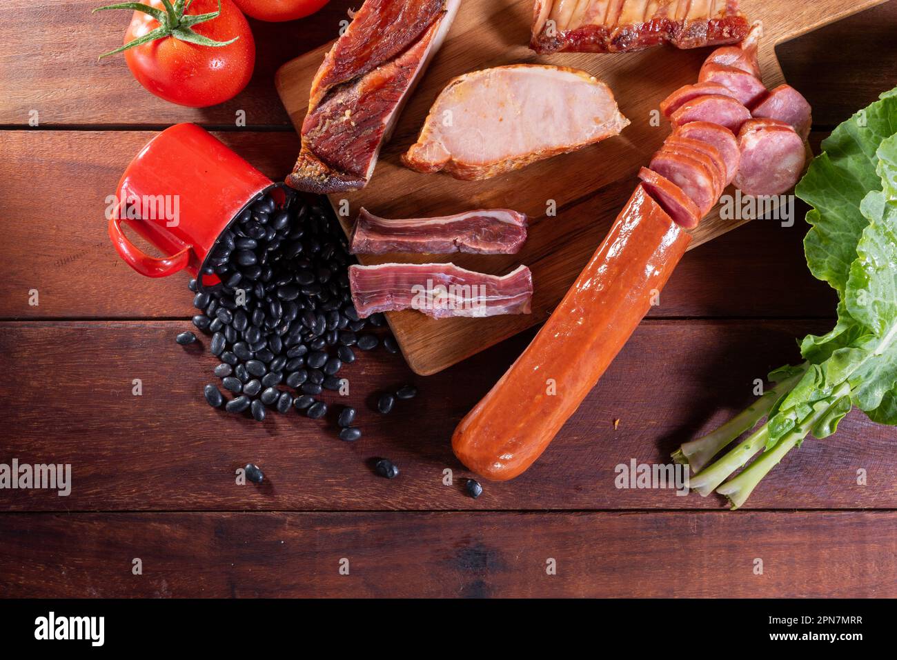 ingredients for brazilian traditional food feijoada Stock Photo - Alamy