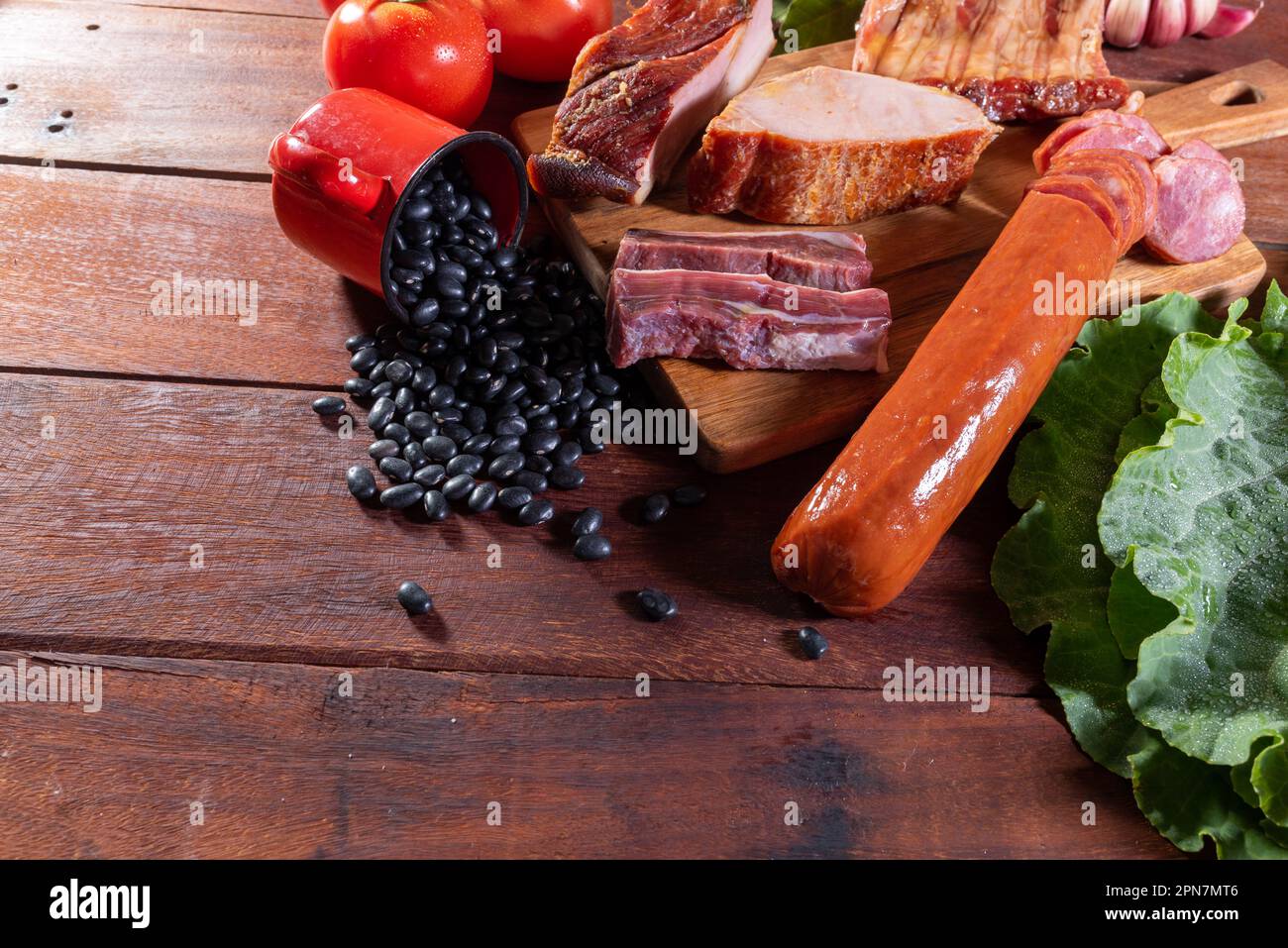 ingredients for brazilian traditional food feijoada Stock Photo - Alamy