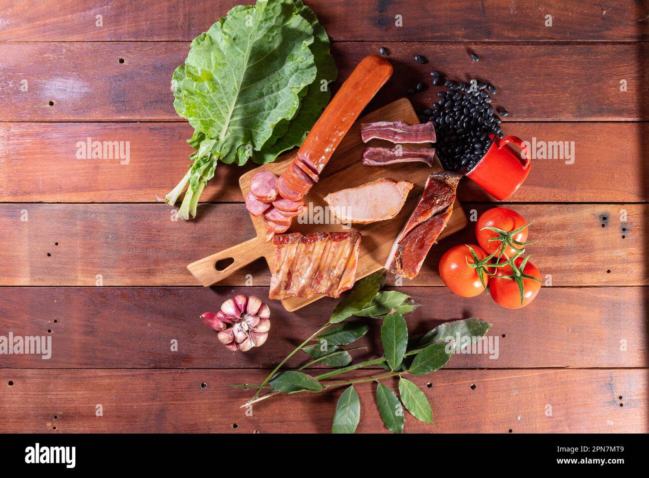 ingredients for brazilian traditional food feijoada Stock Photo - Alamy