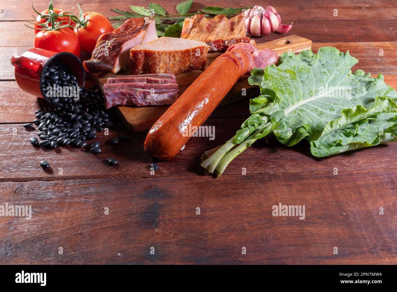 ingredients for brazilian traditional food feijoada Stock Photo - Alamy