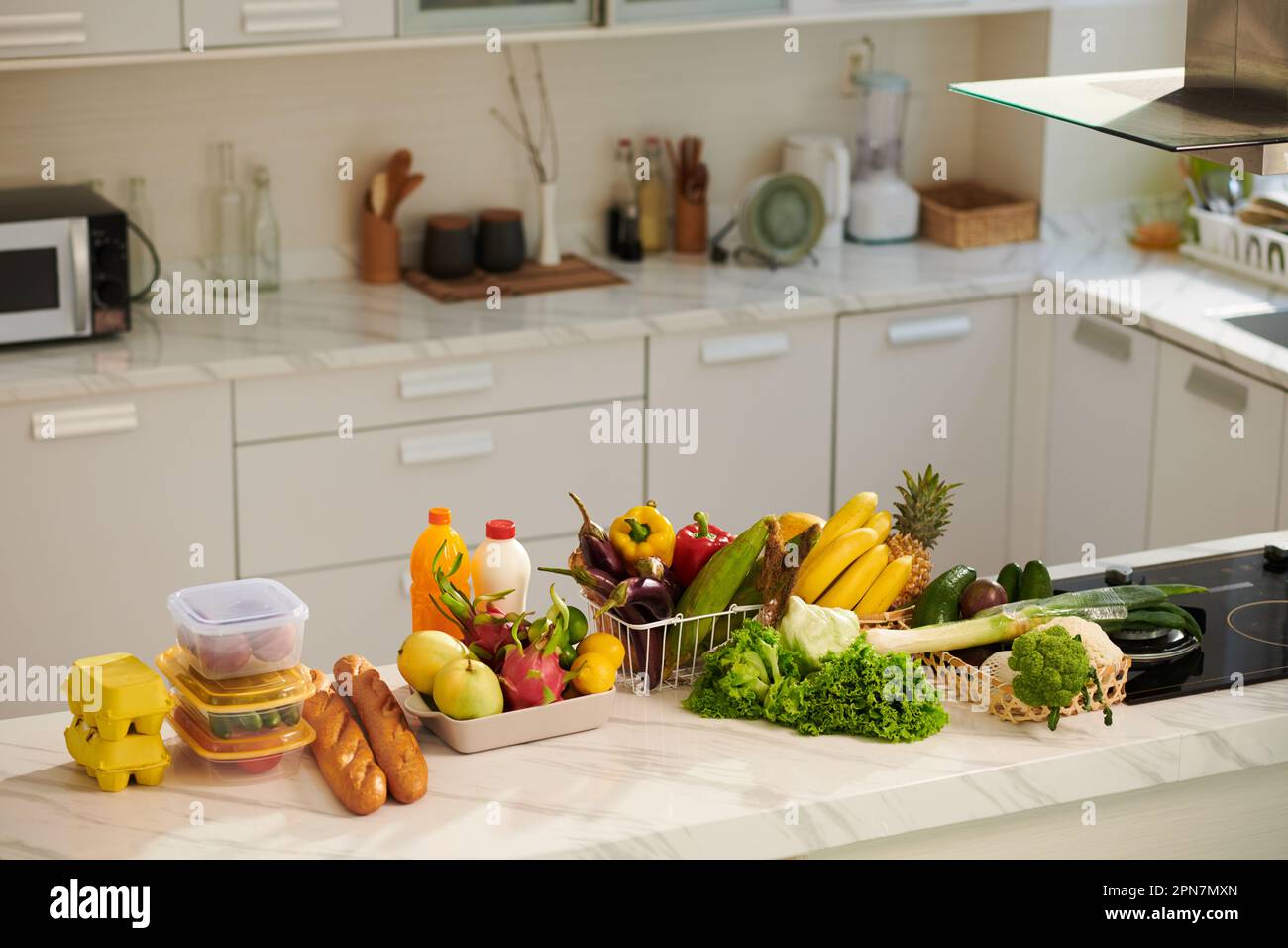 Fresh fruits, vegetables and other groceries on kitchen counter Stock ...