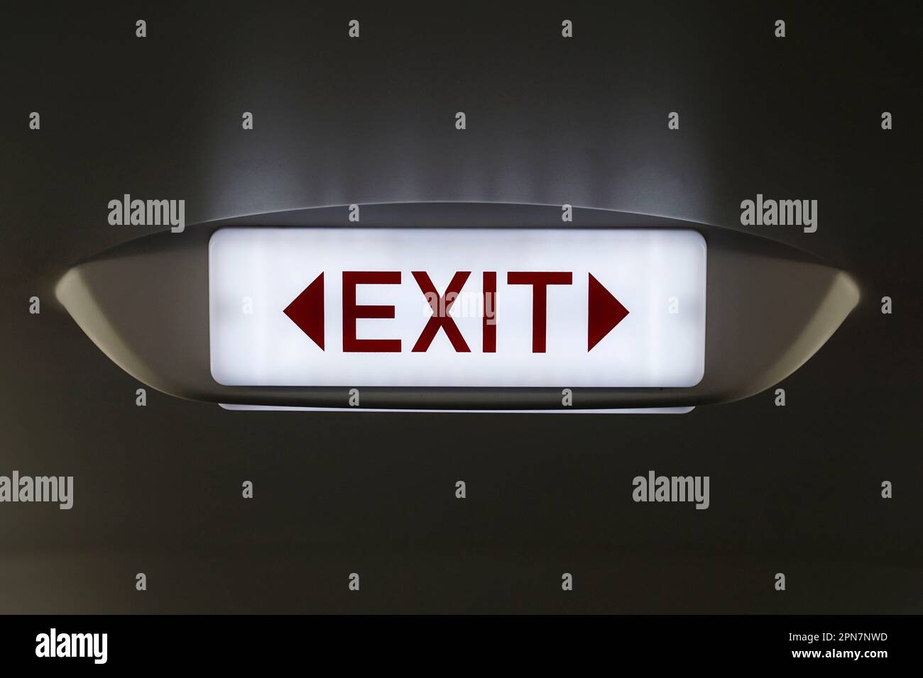 Emergency exit sign inside an airpane Stock Photo - Alamy