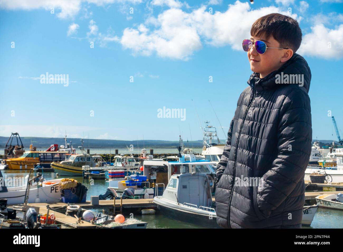 Portrait of a 10 year old by taken at Poole Harbour in Dorset, UK Stock ...