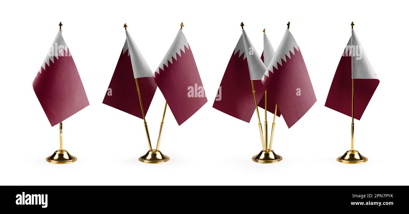 Small national flags of the Qatar on a white background Stock Photo - Alamy